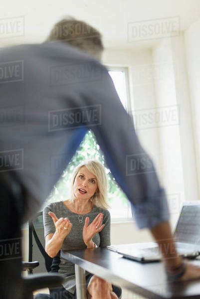 Older Caucasian business people arguing in office meeting - Royalty ...