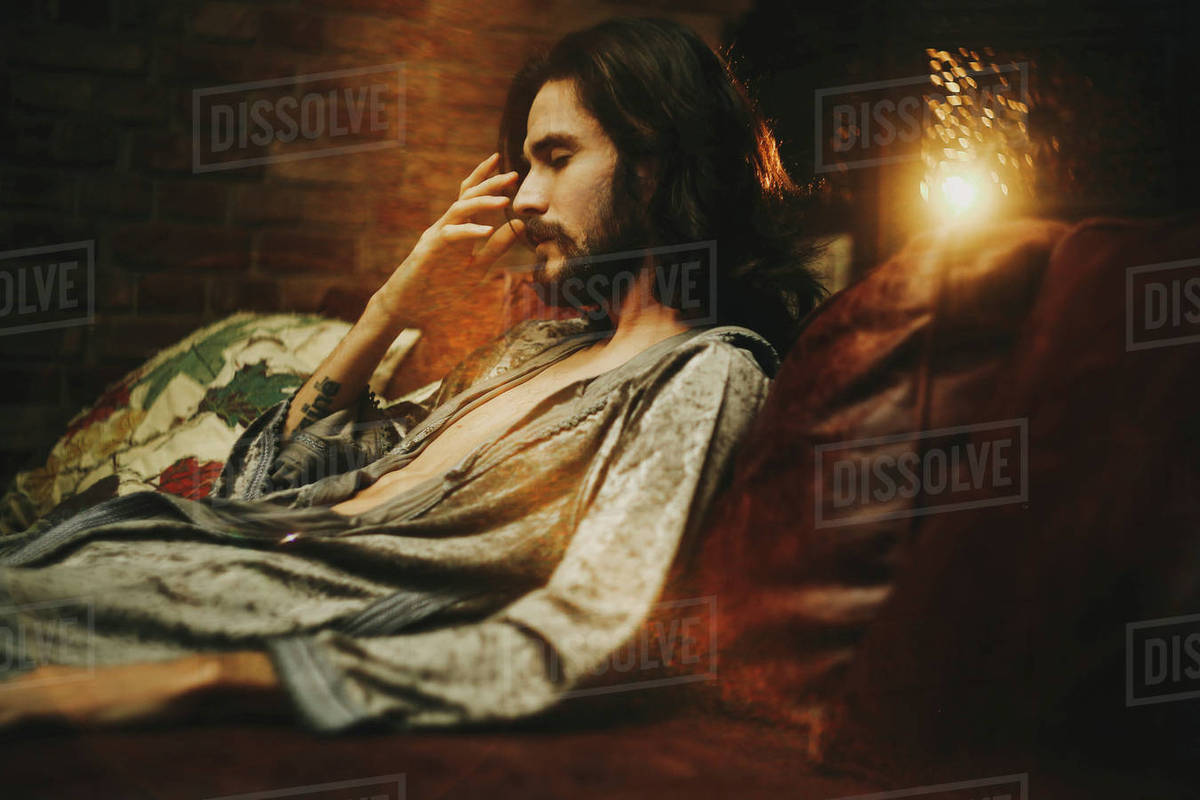 Caucasian man with beard wearing robe - Royalty-free Stock Photo | Dissolve