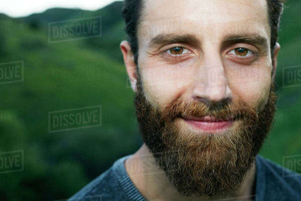 Close up of smiling Mixed Race man with beard - Royalty-free Stock ...