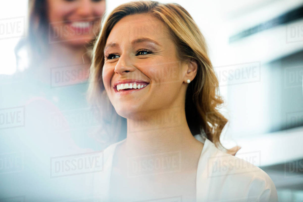 Smiling woman - Stock Photo - Dissolve