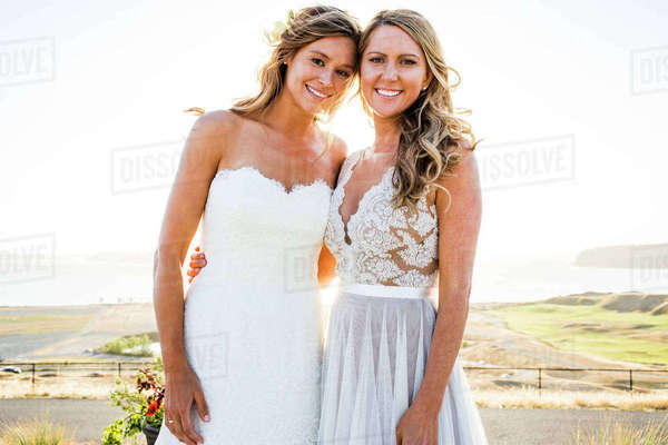 Portrait of smiling brides - Royalty-free Stock Photo | Dissolve