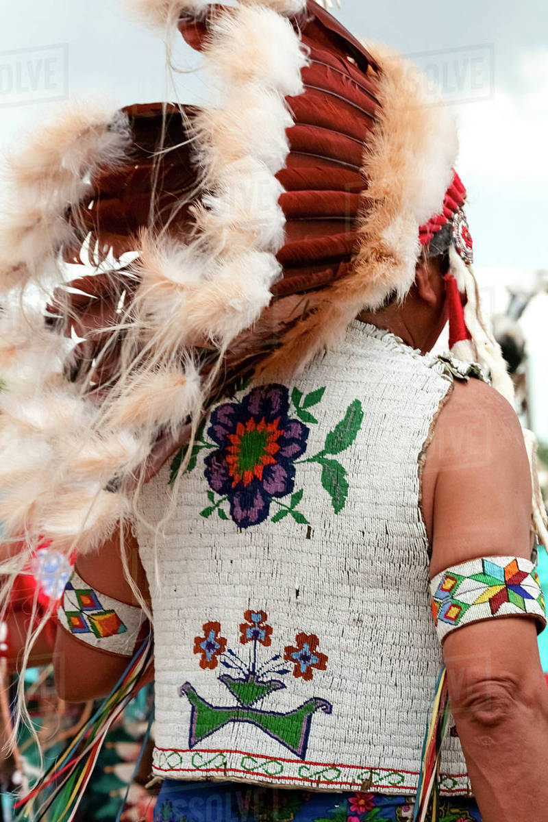 Man wearing traditional headdress - Royalty-free Stock Photo | Dissolve