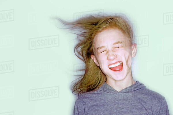 Wind blowing face of Caucasian girl - Royalty-free Stock Photo | Dissolve