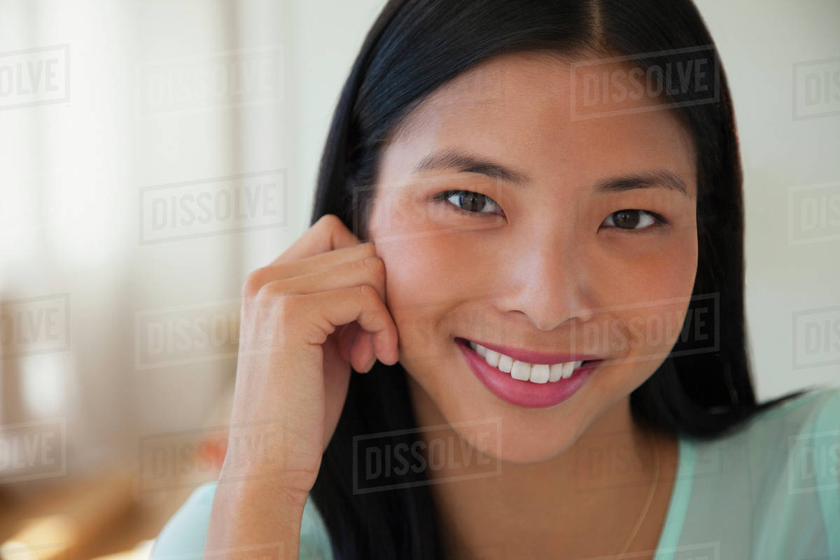 Chinese woman smiling - Royalty-free Stock Photo | Dissolve