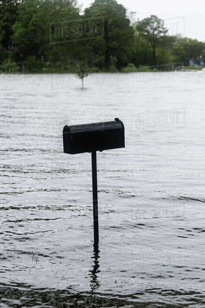 Flooding around mailbox - Stock Photo - Dissolve
