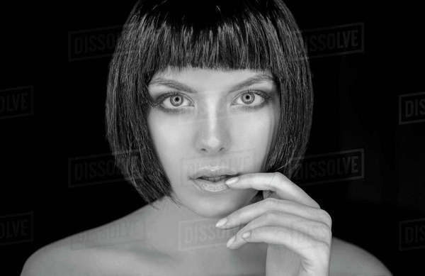 Portrait of serious woman - Royalty-free Stock Photo | Dissolve