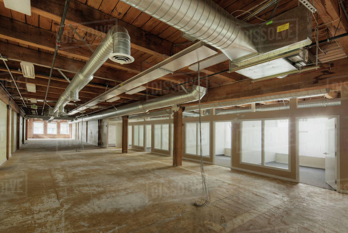 Empty office space under construction - Royalty-free Stock Photo | Dissolve