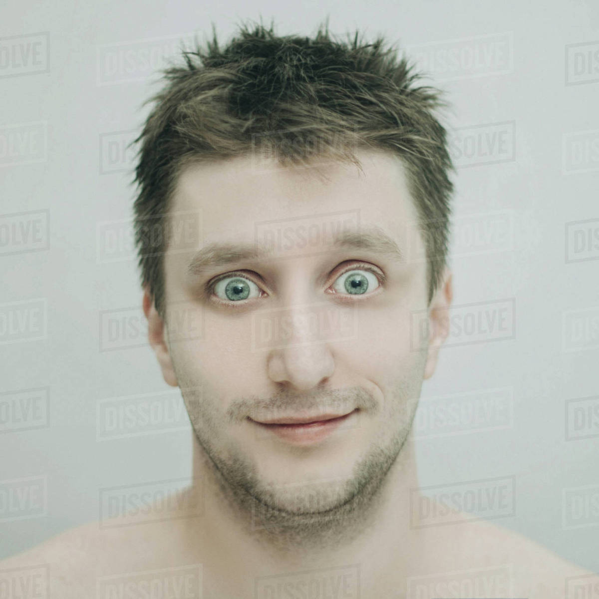 Portrait of wide-eyed Caucasian man - Royalty-free Stock Photo | Dissolve