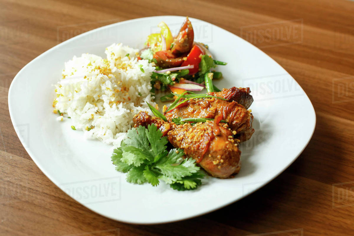 Rice and meat on plate - Royalty-free Stock Photo | Dissolve