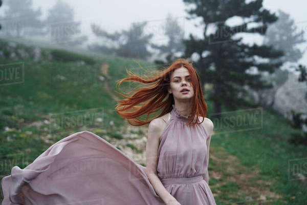 Wind blowing hair of Caucasian woman in field - Royalty-free Stock ...