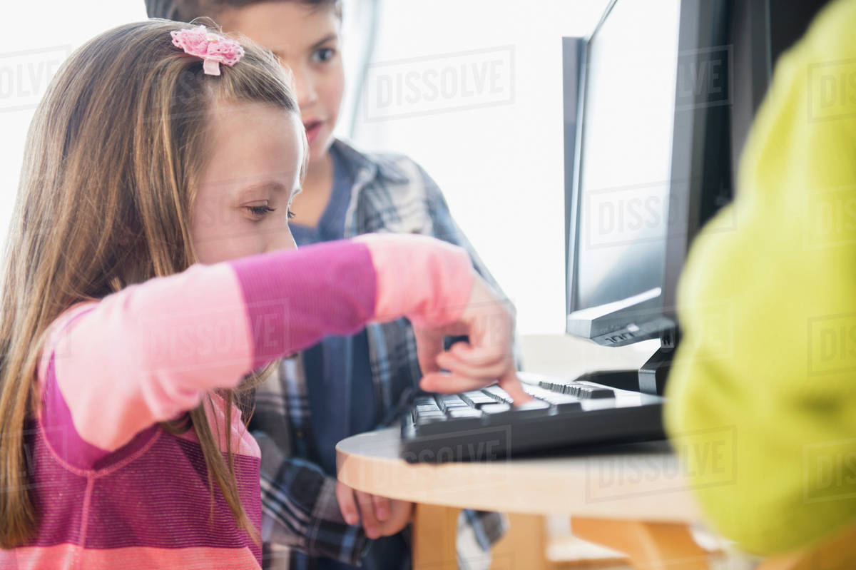 Children using computers in classroom - Royalty-free Stock Photo | Dissolve