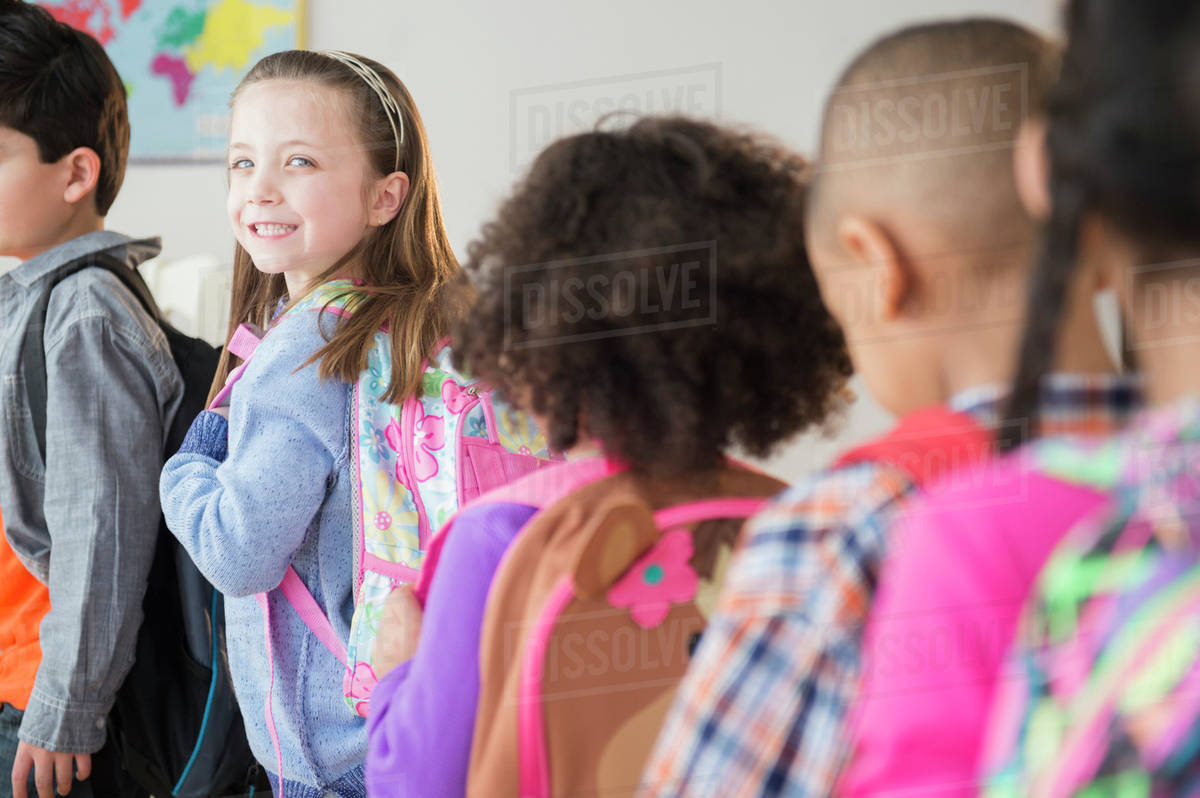 Students standing in line in classroom - Royalty-free Stock Photo ...