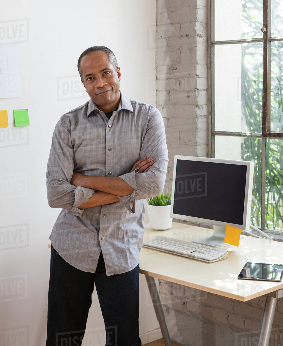 African American architect smiling in office - Royalty-free Stock Photo ...