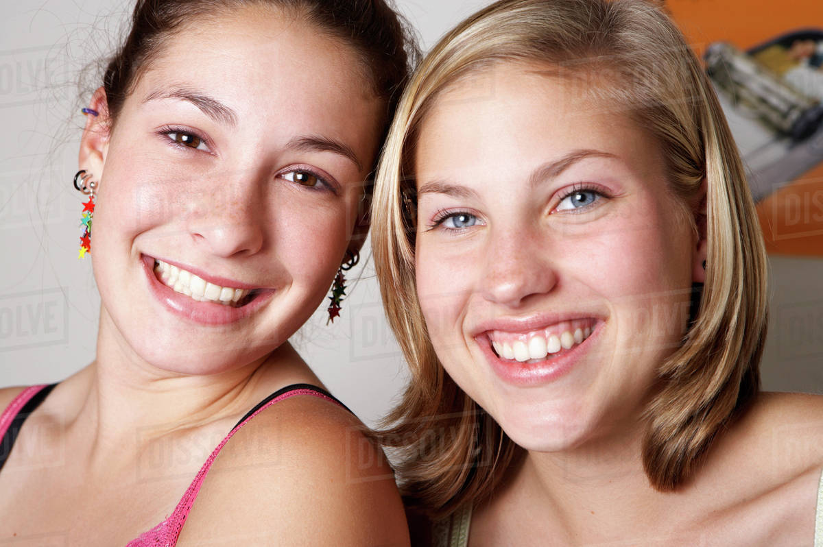 Caucasian teenage girls smiling together - Royalty-free Stock Photo ...