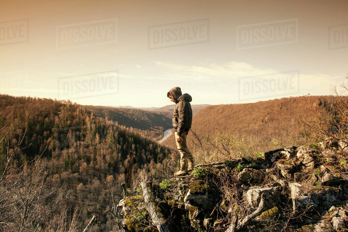 Mari man overlooking rural landscape - Royalty-free Stock Photo | Dissolve