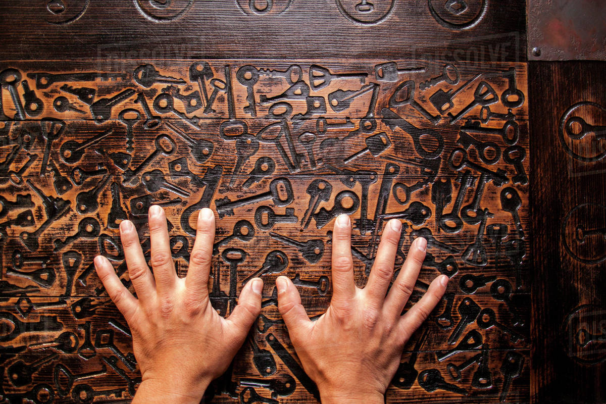 Close up of hands of Mari man hands on wooden surface - Royalty-free ...