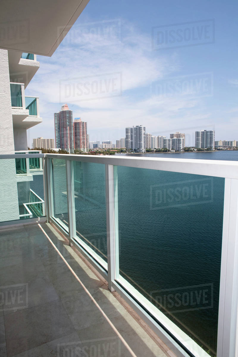 Balcony overlooking high rises in urban cityscape, Miami, Florida ...