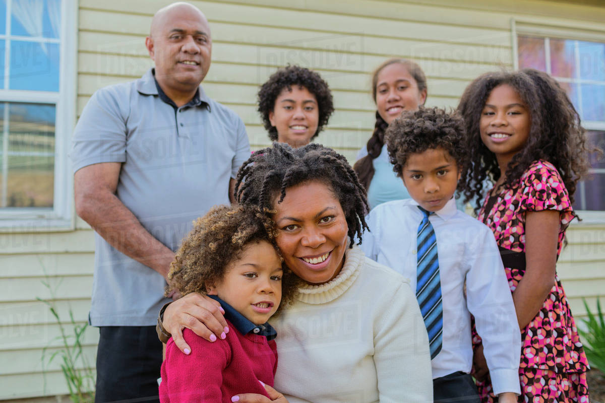 Pacific Islander family smiling outdoors - Royalty-free Stock Photo ...