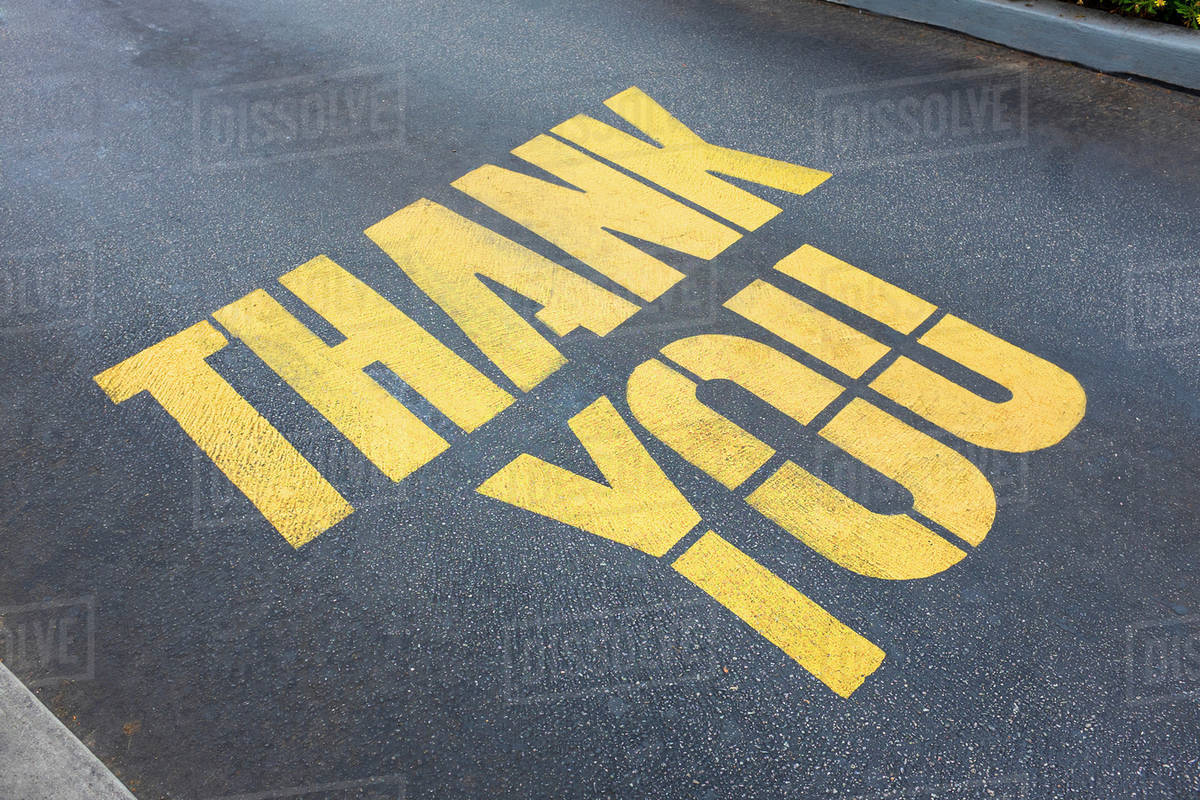 'Thank you' painted on concrete - Stock Photo - Dissolve