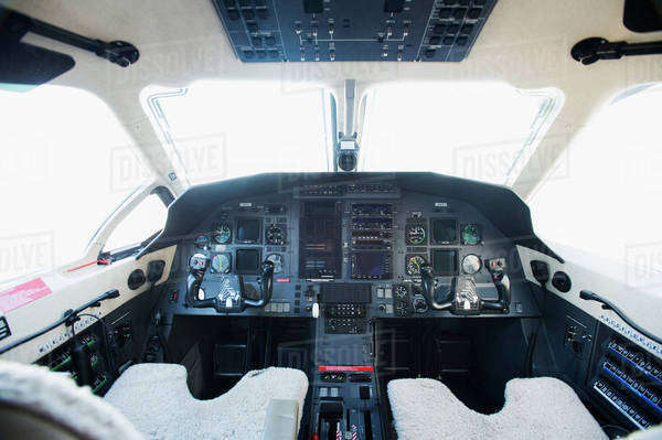 Empty airplane cockpit - Stock Photo - Dissolve