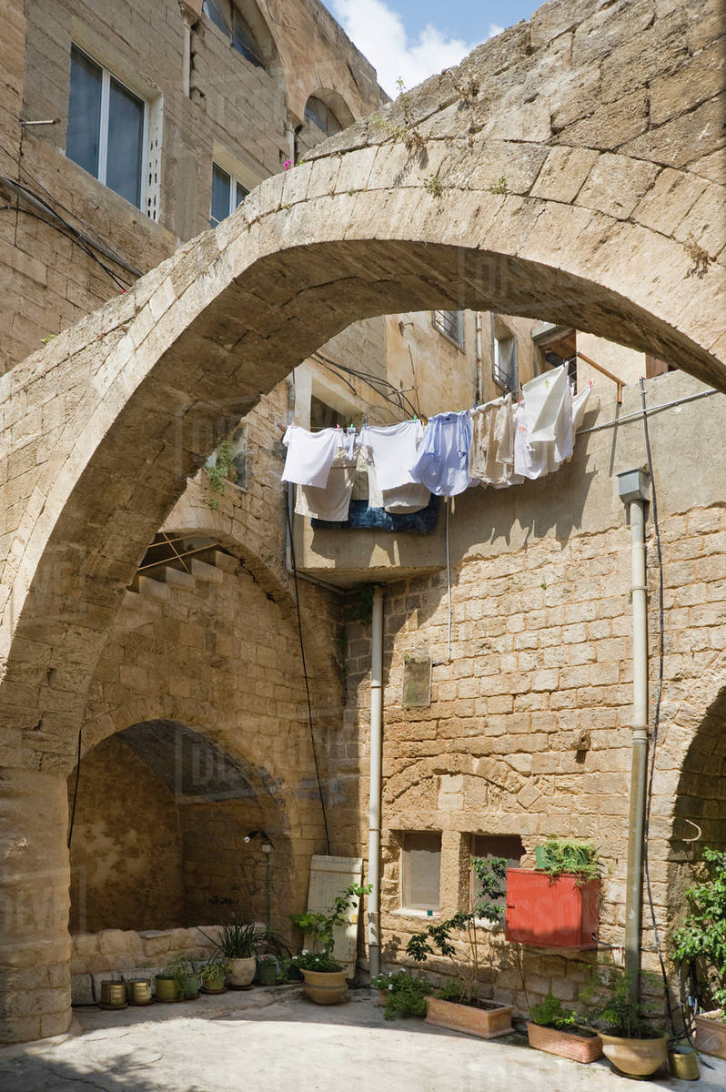 Courtyard with Drying Laundry - Royalty-free Stock Photo | Dissolve