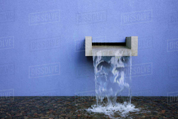 Water Pouring into Pool - Stock Photo - Dissolve