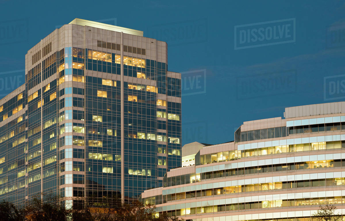 Downtown Office Buildings At Night - Stock Photo - Dissolve