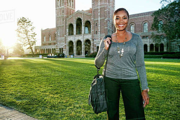African American professor smiling on campus - Royalty-free Stock Photo ...