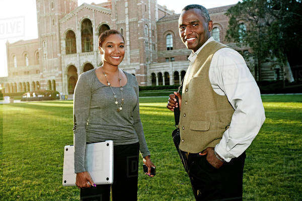 African American professors talking on campus - Royalty-free Stock ...