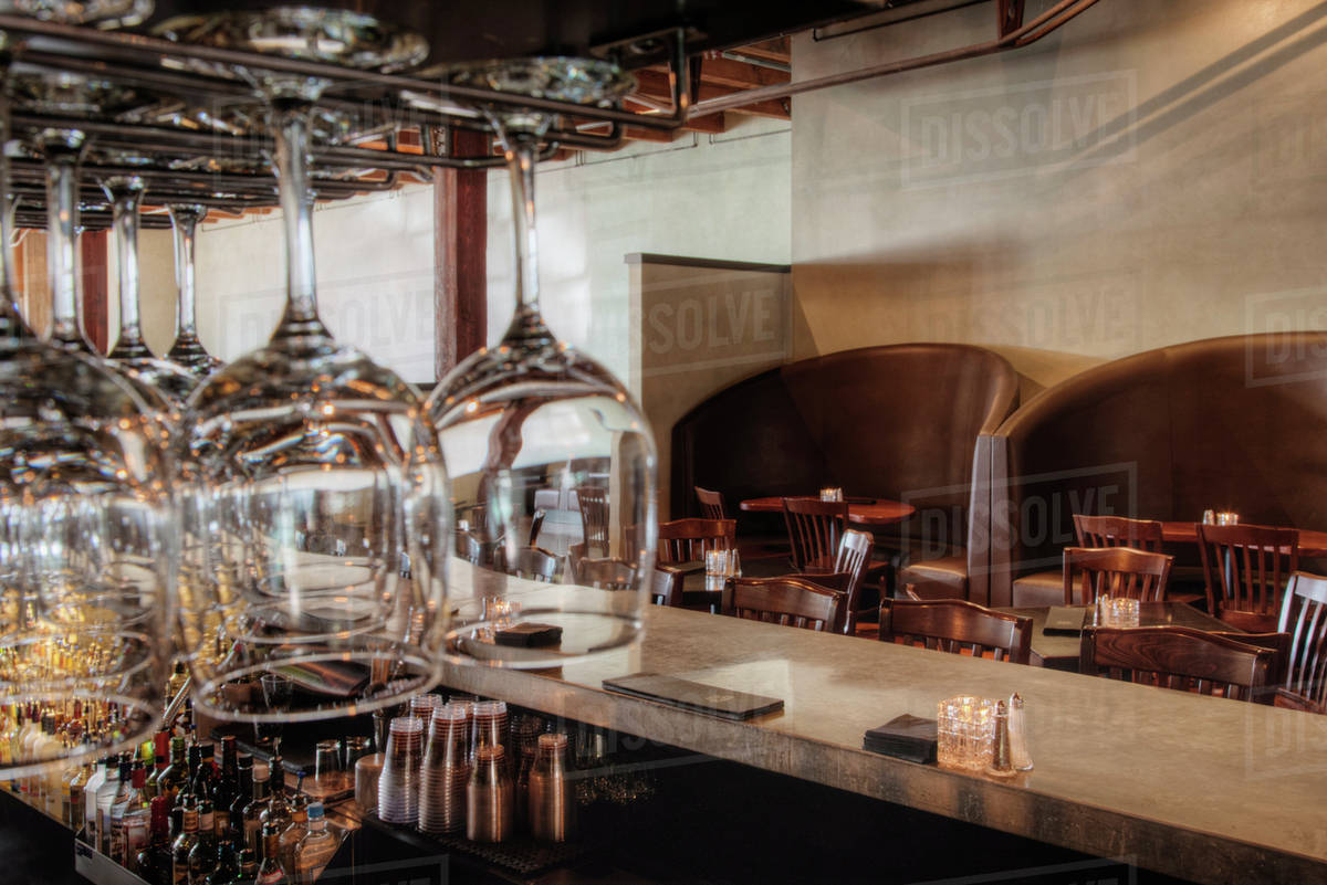 Empty bar and tables in restaurant - Royalty-free Stock Photo | Dissolve