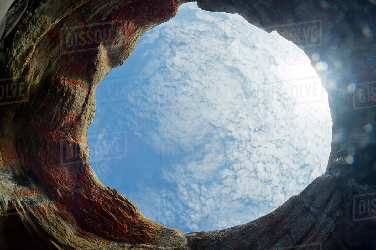 Sky viewed through rock formation - Royalty-free Stock Photo | Dissolve