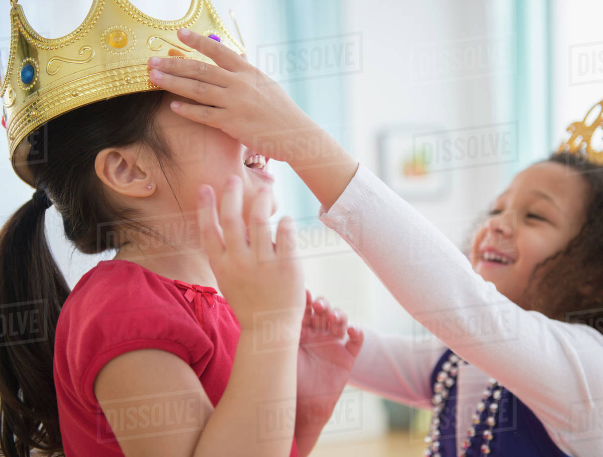 Girls playing dress up together - Stock Photo - Dissolve