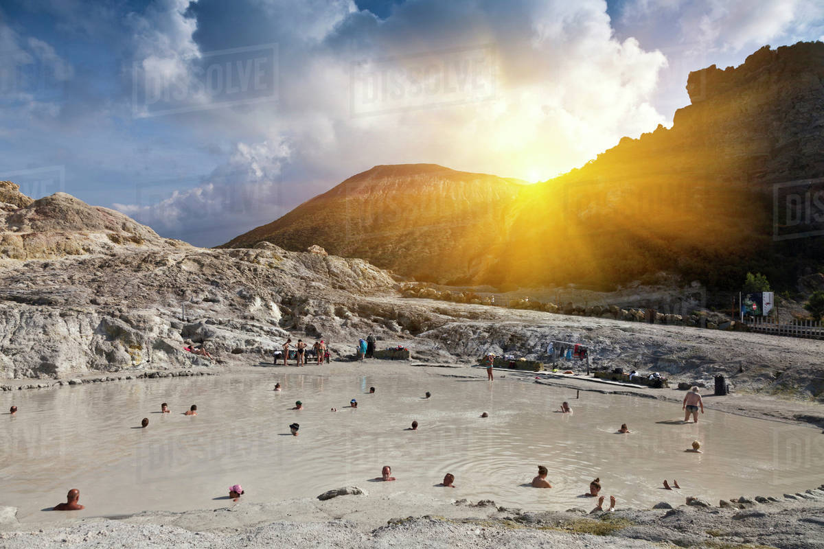 People bathing in hot springs, Isle Vulcano, Sicily, Italy - Royalty ...