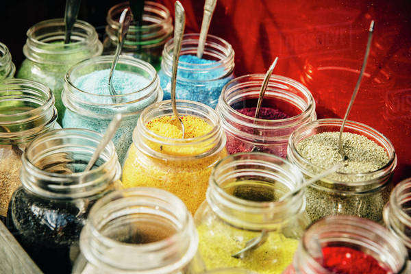 Close up of jars of pigment powder - Royalty-free Stock Photo | Dissolve
