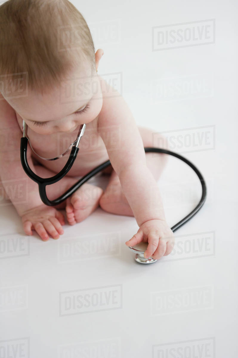 Caucasian baby girl playing with stethoscope - Royalty-free Stock Photo ...