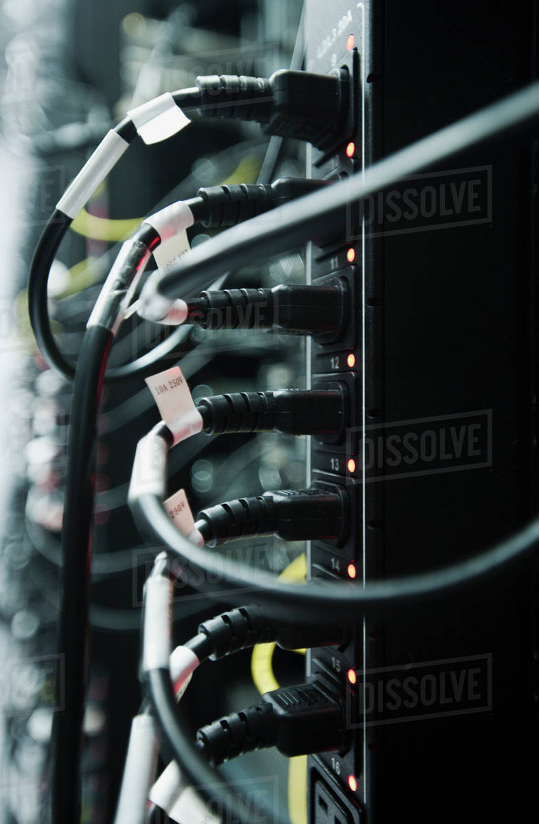 Close up of computer cords - Stock Photo - Dissolve