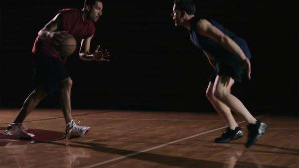 Two basketball players go one on one trying to score - Stock Video ...