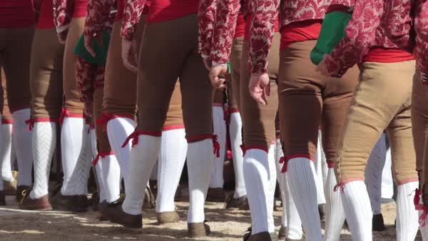 Tourada - Forcados in beige pants walking on the arena in a row - Stock ...