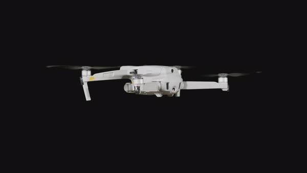 Drone hovering in the air with alpha channel. Real quadcopter with ...