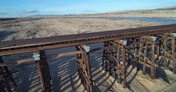 Wooden train trestle bridge - Stock Video Footage - Dissolve