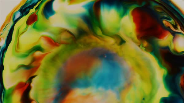 Vibrant colors swirl and mix in a liquid as it rotates. - Stock Video ...