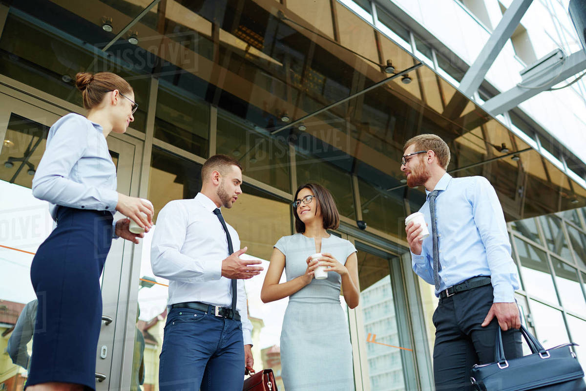 Modern managers having meeting in urban environment - Royalty-free ...