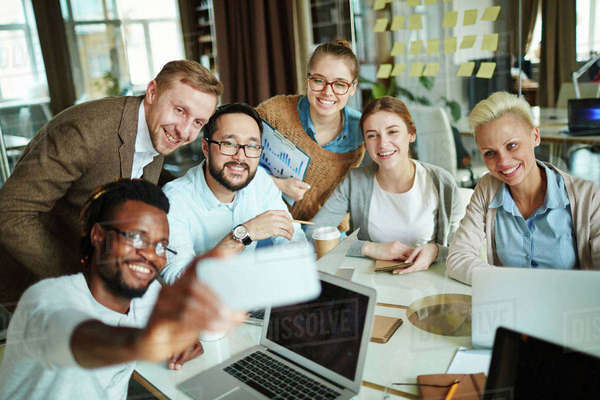 Group of managers making selfie in office - Royalty-free Stock Photo ...