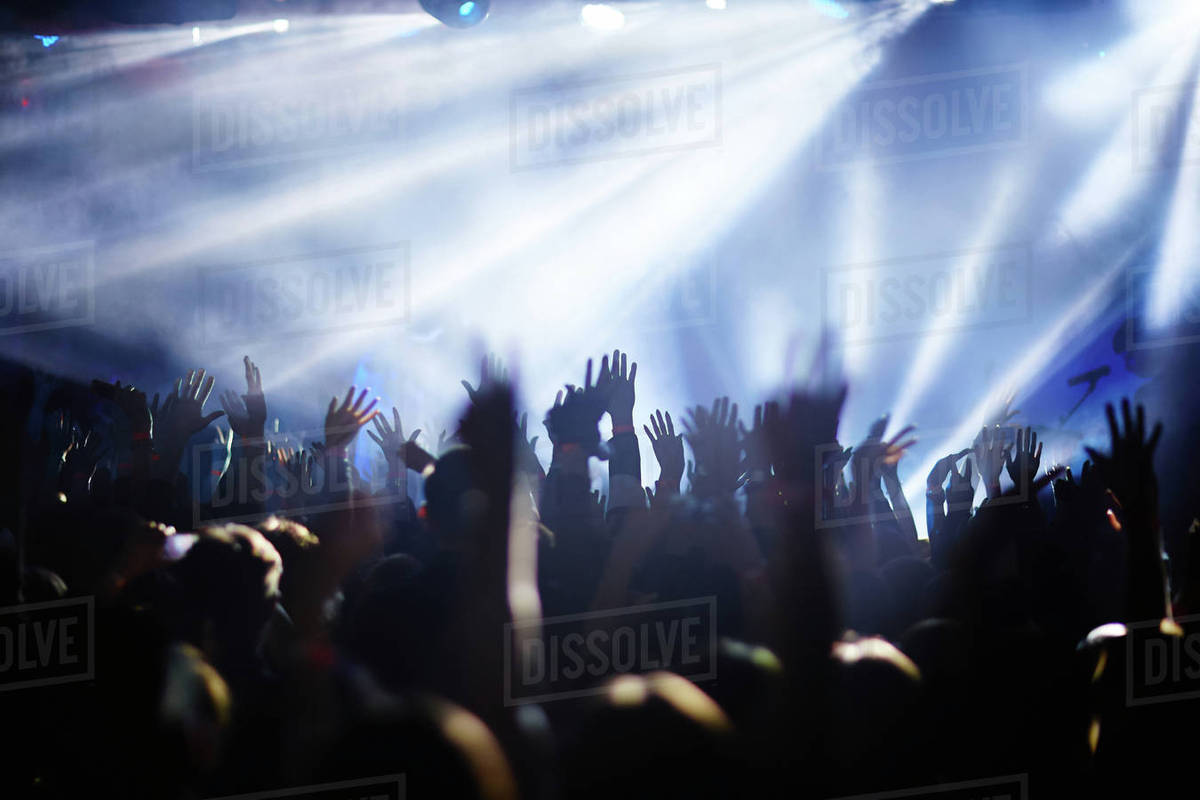 Crowd of people at a concert shot from behind - Royalty-free Stock ...