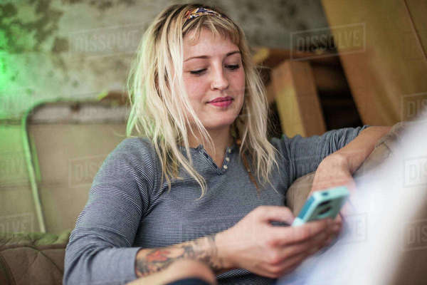 Portrait of a young woman on her cell phone. - Royalty-free Stock Photo ...