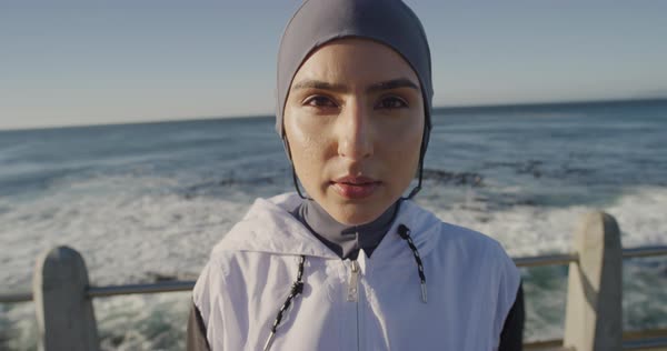 Young woman runner confident Muslim female enjoying healthy fitness ...