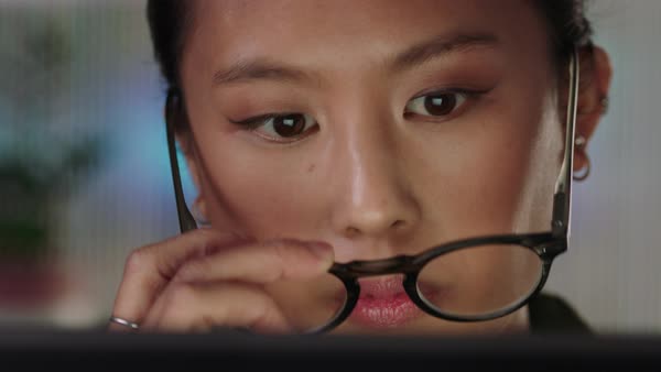 Close up portrait beautiful asian business woman working late using ...