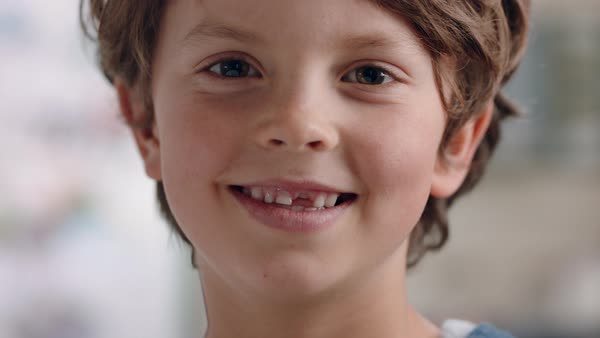 Portrait happy little boy smiling at camera cute child looking cheerful ...