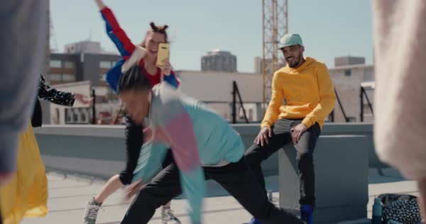 Man breakdancing on rooftop at hip hop dance party performing crazy ...