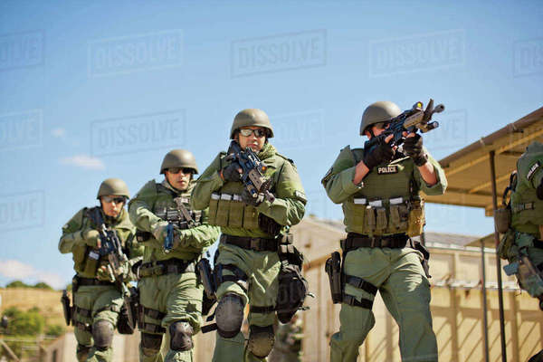 Group of police officers during an exercise at training facility ...